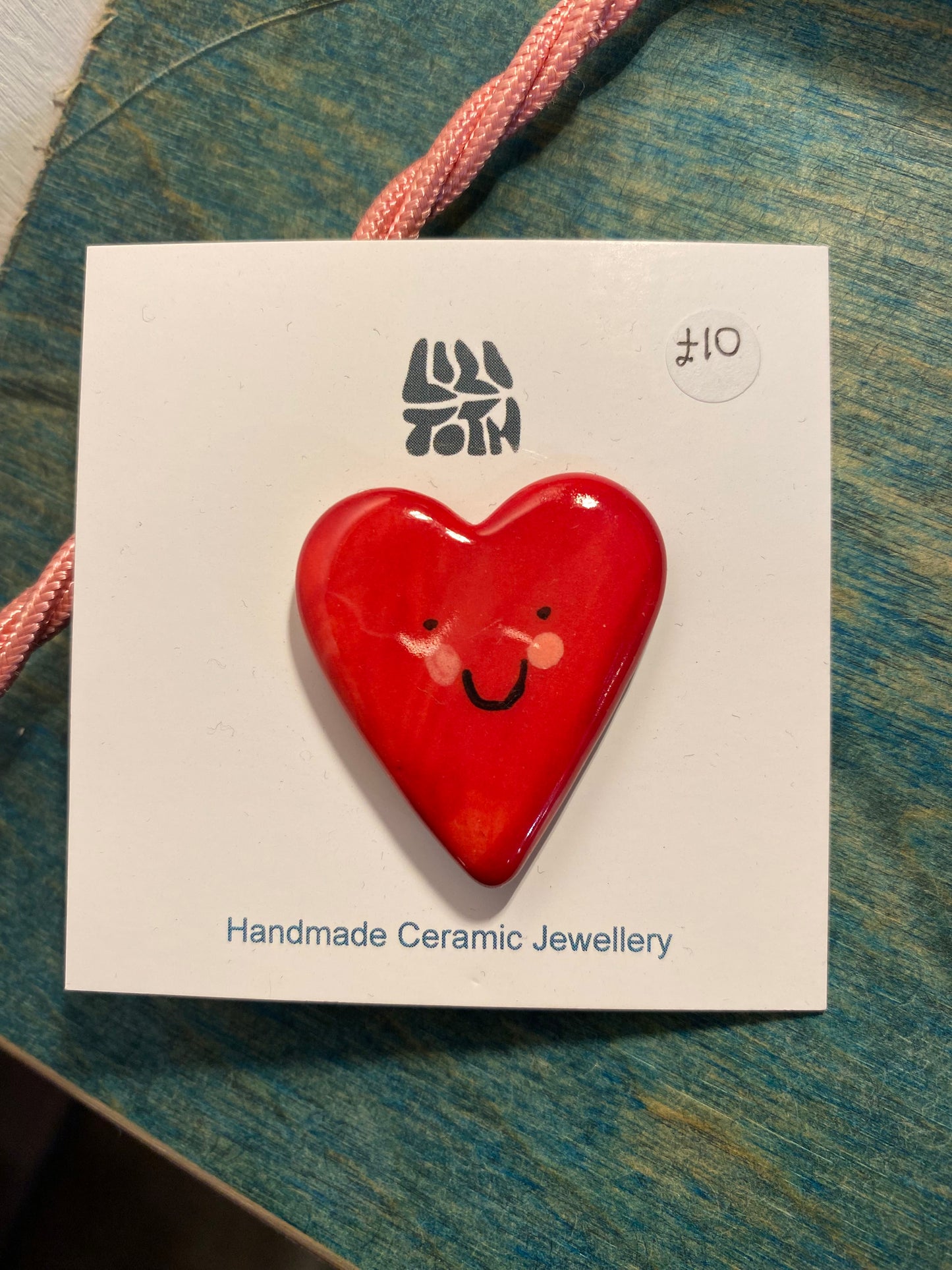 Smiley Red Heart Ceramic pin by Lili Toth – The Stanley Road Store
